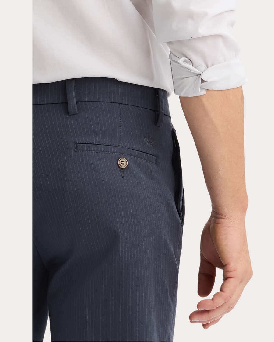 View of model wearing Harris India Ink Workday Khakis, Straight Fit.